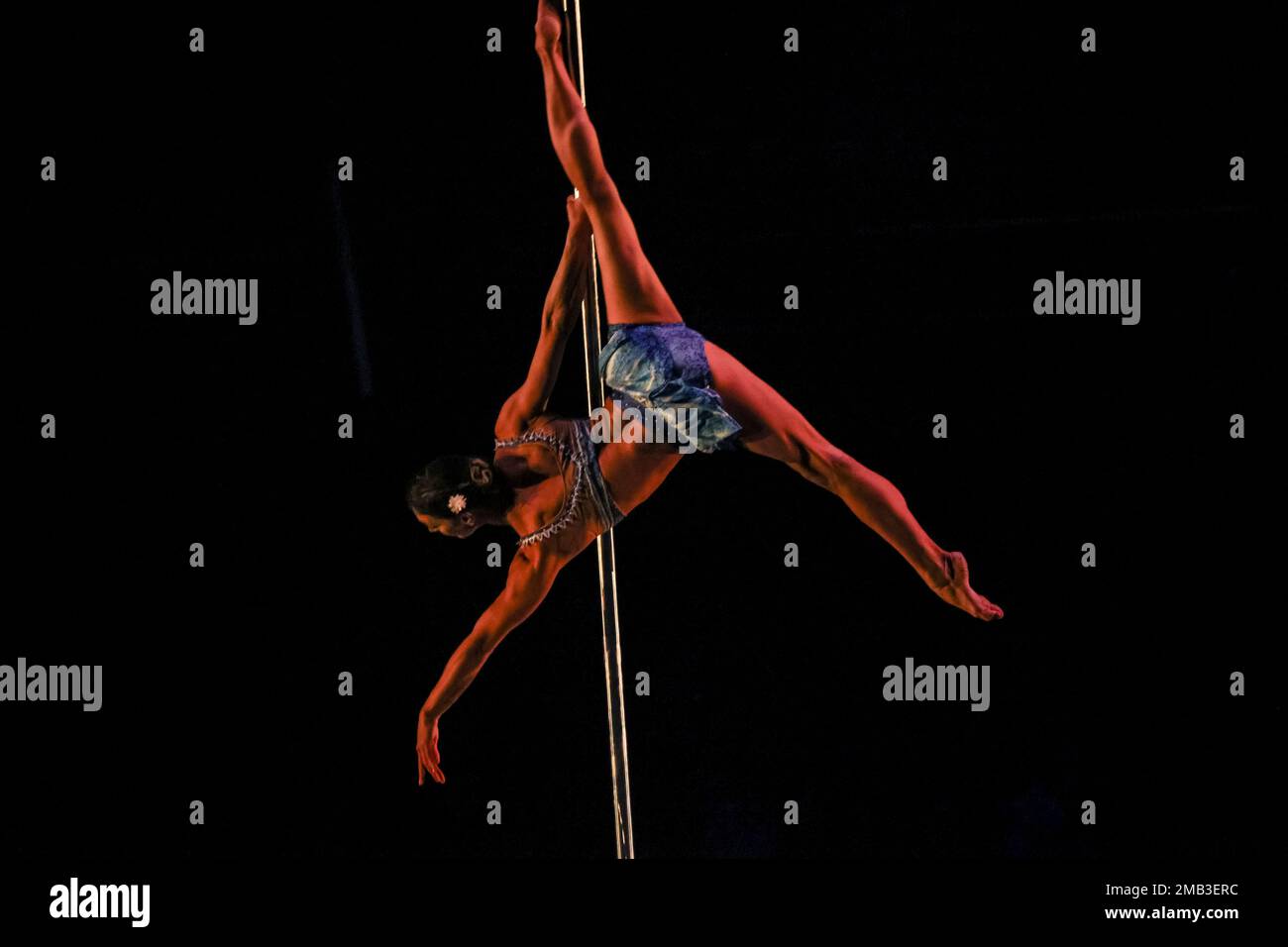 Artists perform 'Suspended Pole' during the Cirque du Soleil Corteo ...