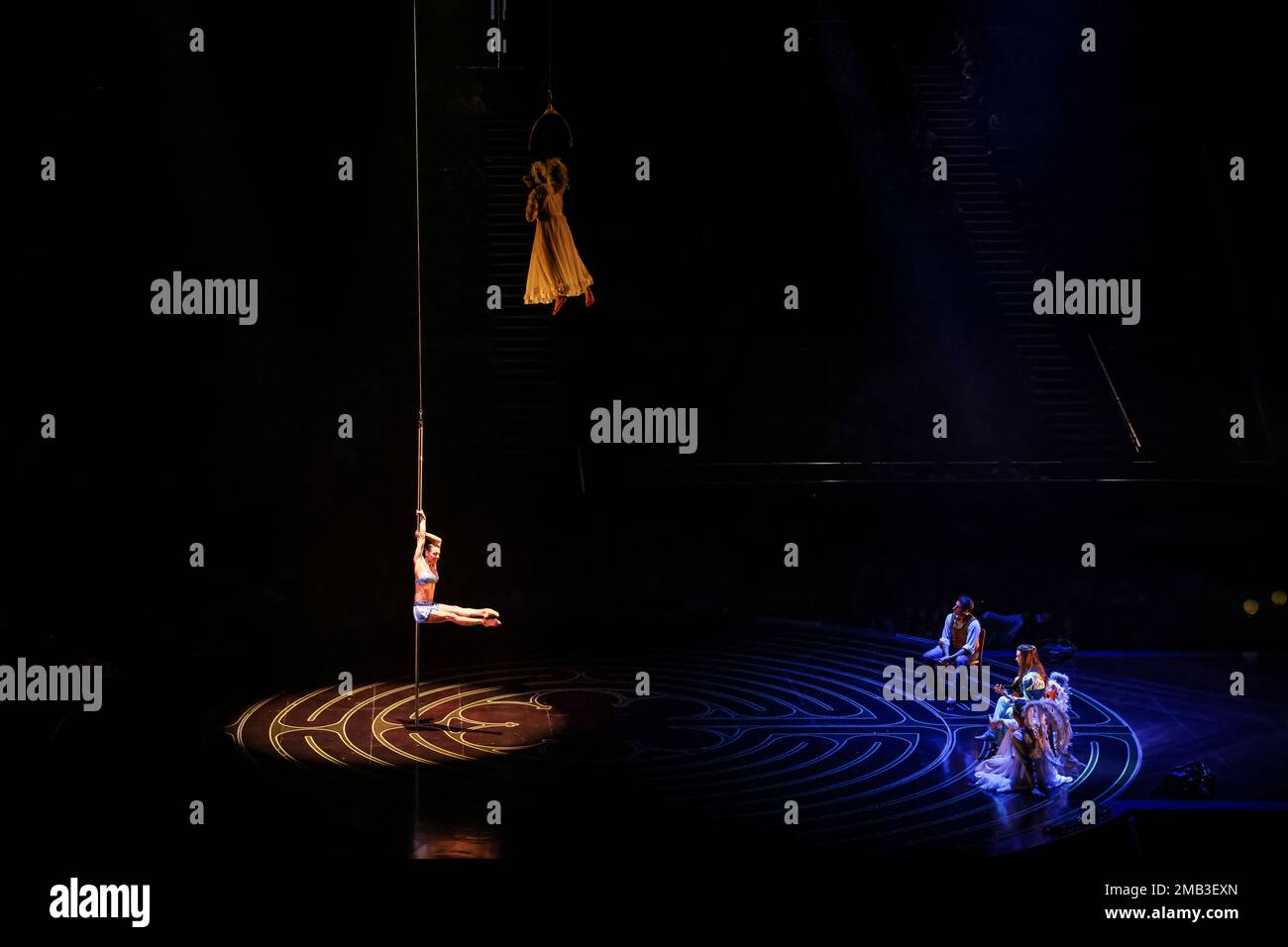 Artists perform 'Suspended Pole' during the Cirque du Soleil Corteo ...