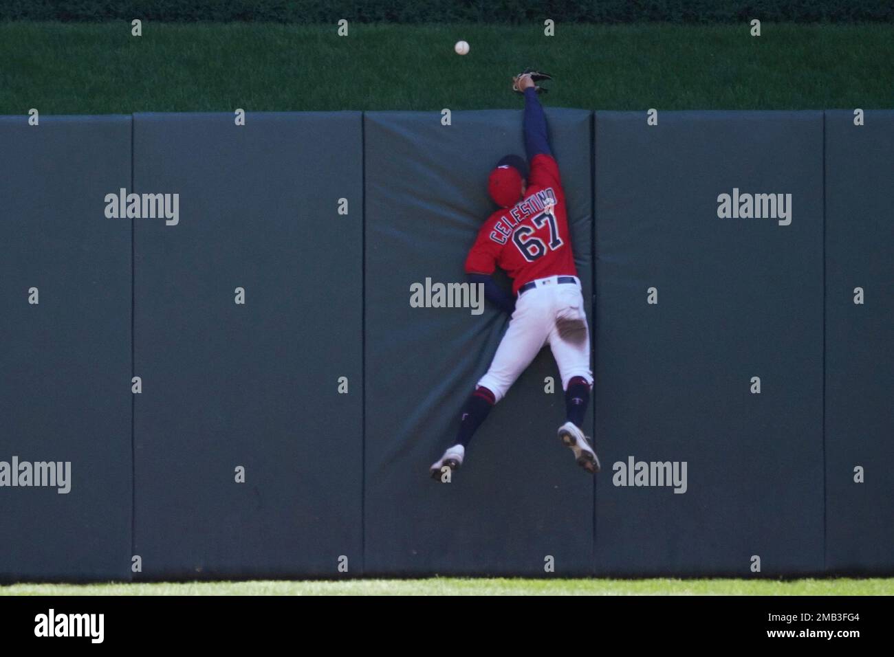 Minnesota Twins center fielder Gilberto Celestino (67) makes a jumping ...