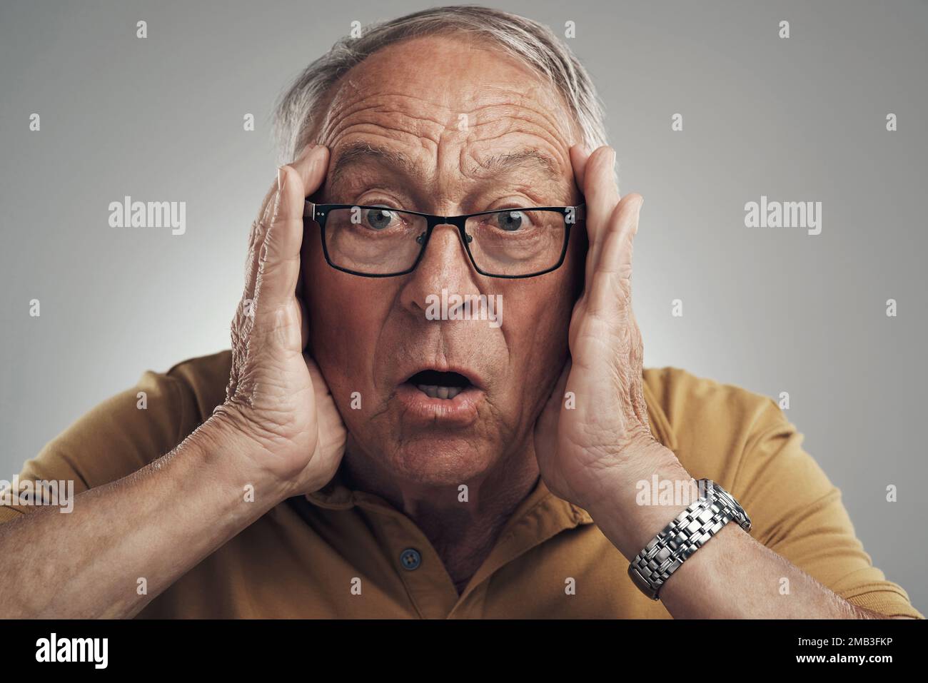 He cant handle the suspense. Studio shot of an elderly man getting a ...