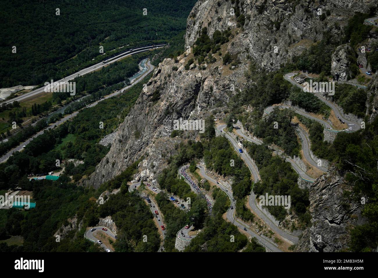 The pack climbs Lacets de Montvernier during the eleventh stage of the ...