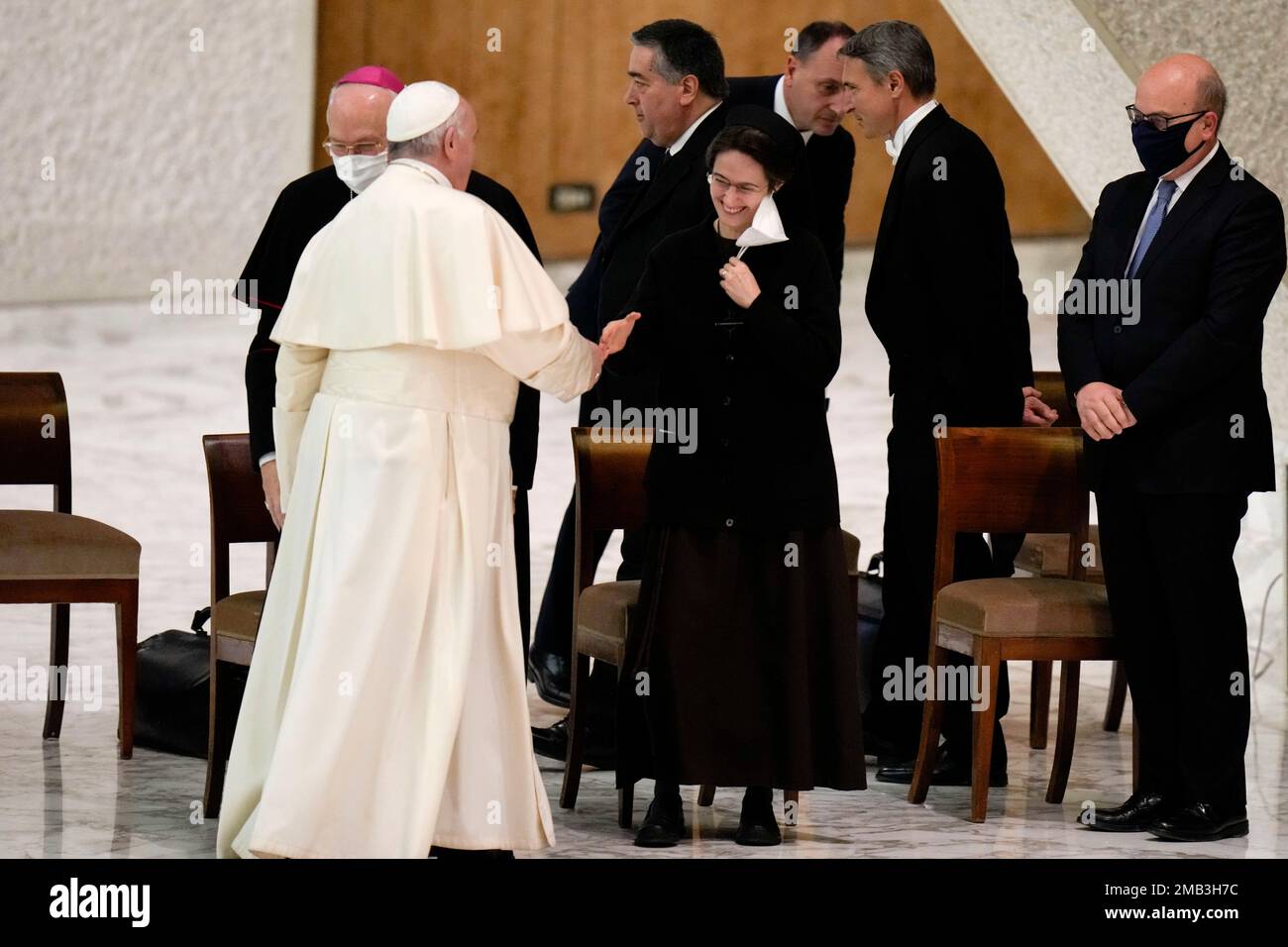 FILE - Pope Francis shakes hands with Sister Raffaella Petrini ...