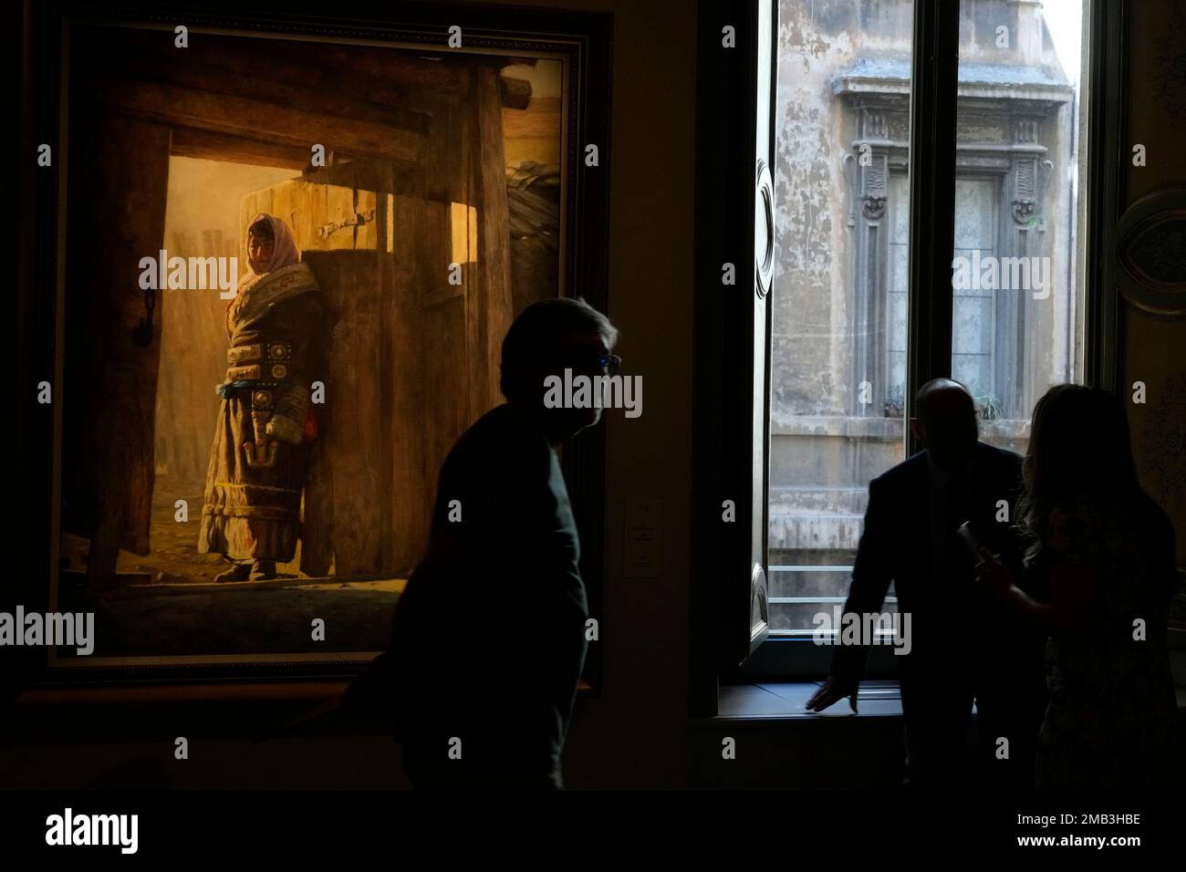 "The Custodian" painting is displayed during the unveiling of the ...