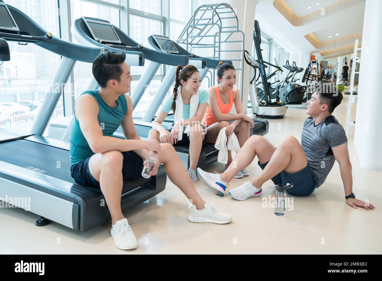 Young people in the gym Stock Photo - Alamy
