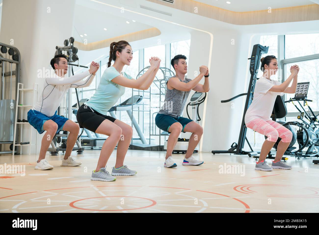 Young people in the gym Stock Photo - Alamy
