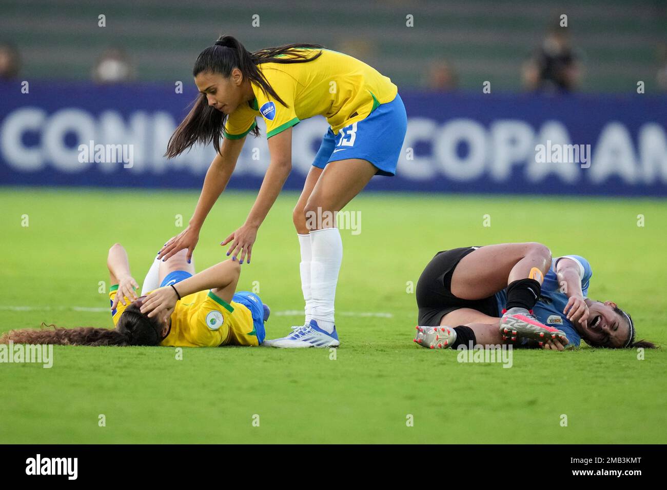Brazil's Antonia, center, checks on her teammate Angelina, left, who ...