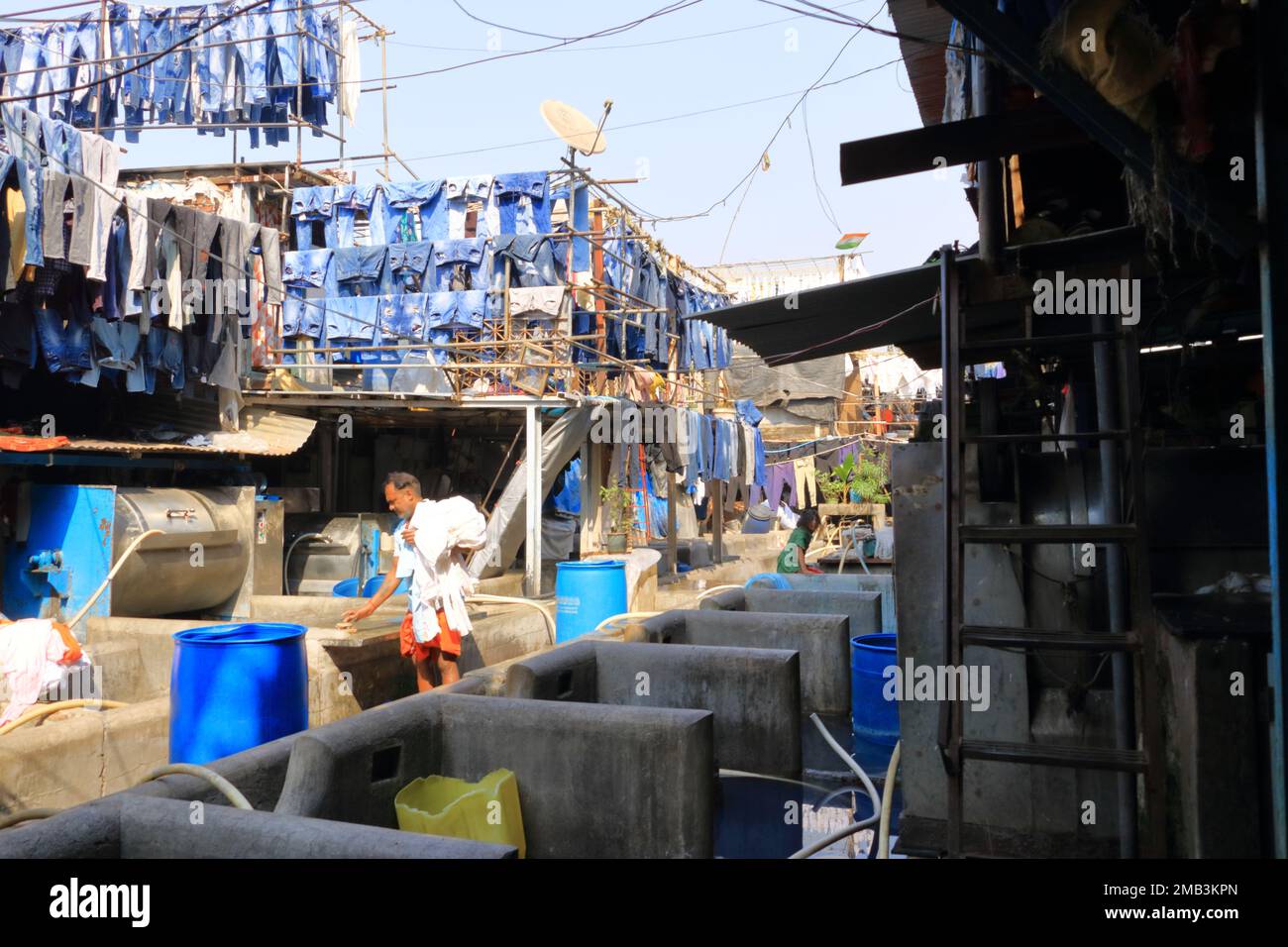 December 21 2022 - Mumbai, Maharashtra in India: People washing clothes ...