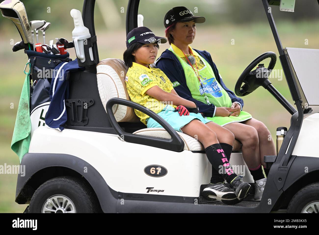 Miroku Suto of Japan, left, and her mother Miyuki Suto look on on the fourth hole during the ...