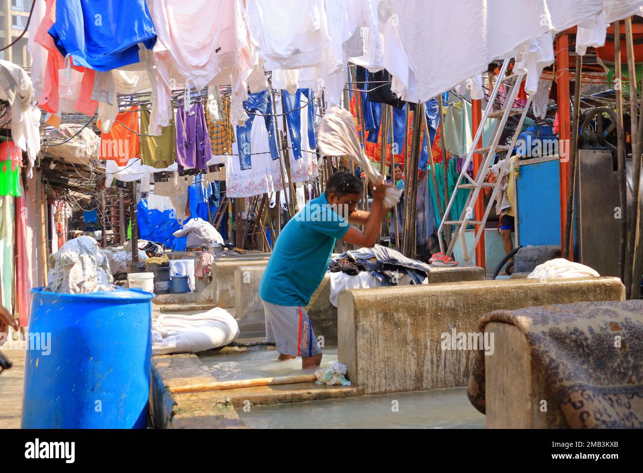 December 21 2022 - Mumbai, Maharashtra in India: People washing clothes ...