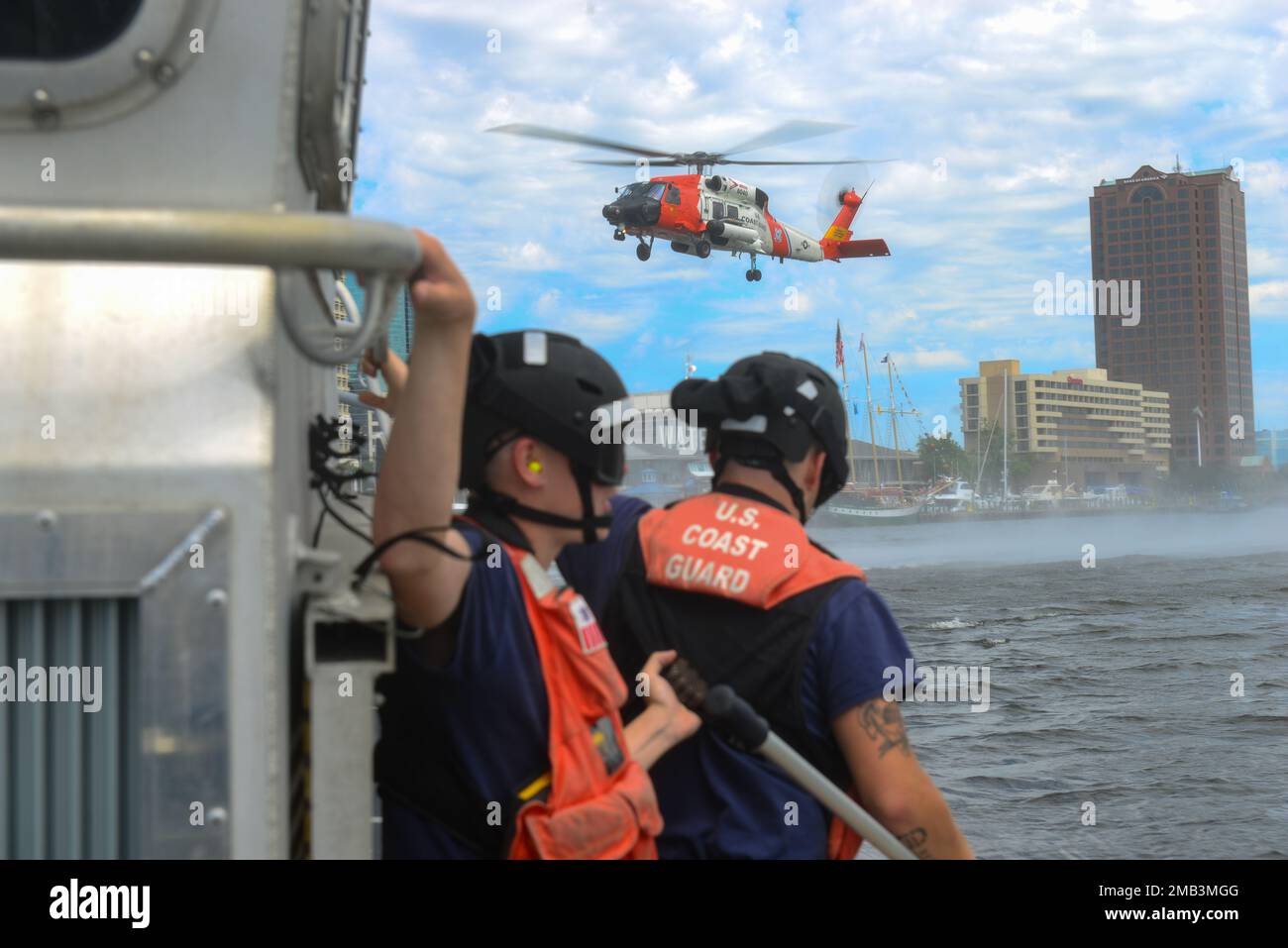 A Coast Guard Air Station Elizabeth City MH-60 Jayhawk helicopter crew ...