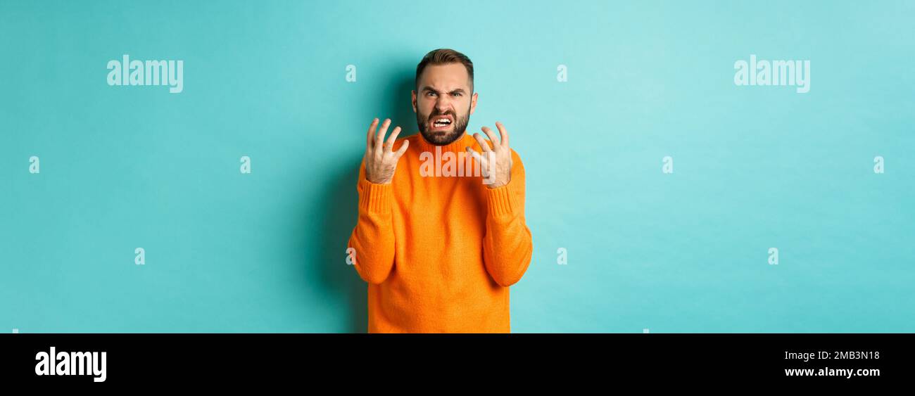 Image of angry man looking disappointed and mad, shaking hands and ...
