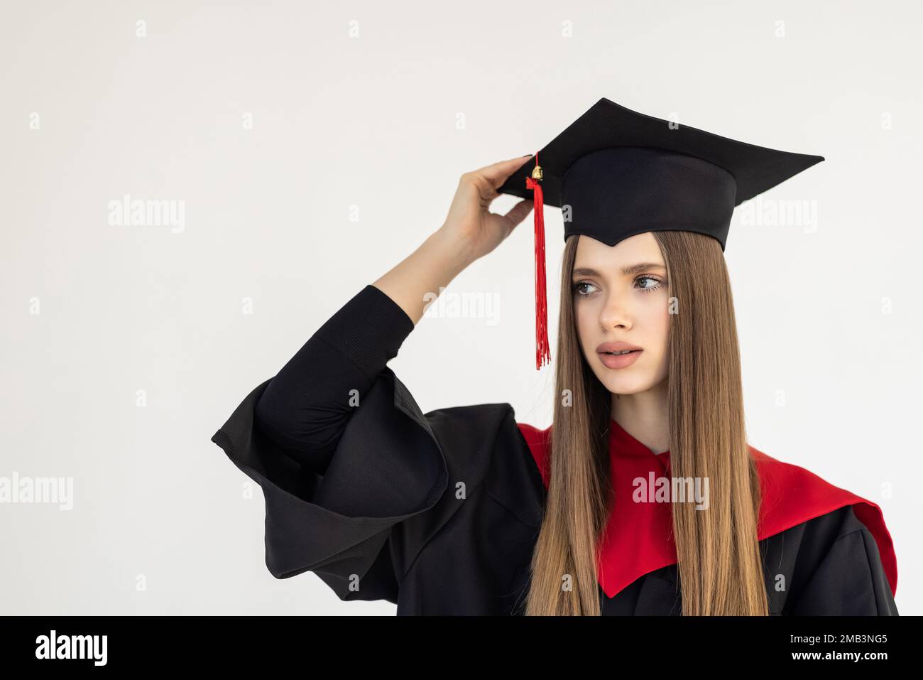 Educational theme: graduating student girl in an academic gown ...