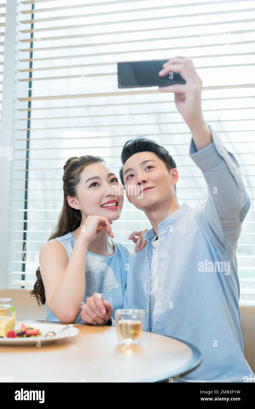 The afternoon tea time young lovers Stock Photo - Alamy