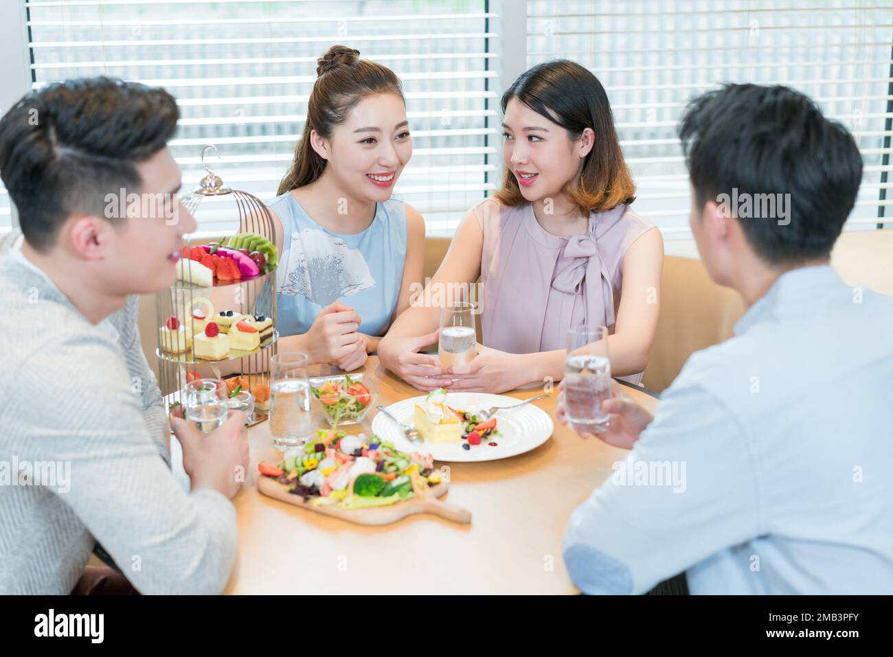 The afternoon tea time of young people Stock Photo - Alamy