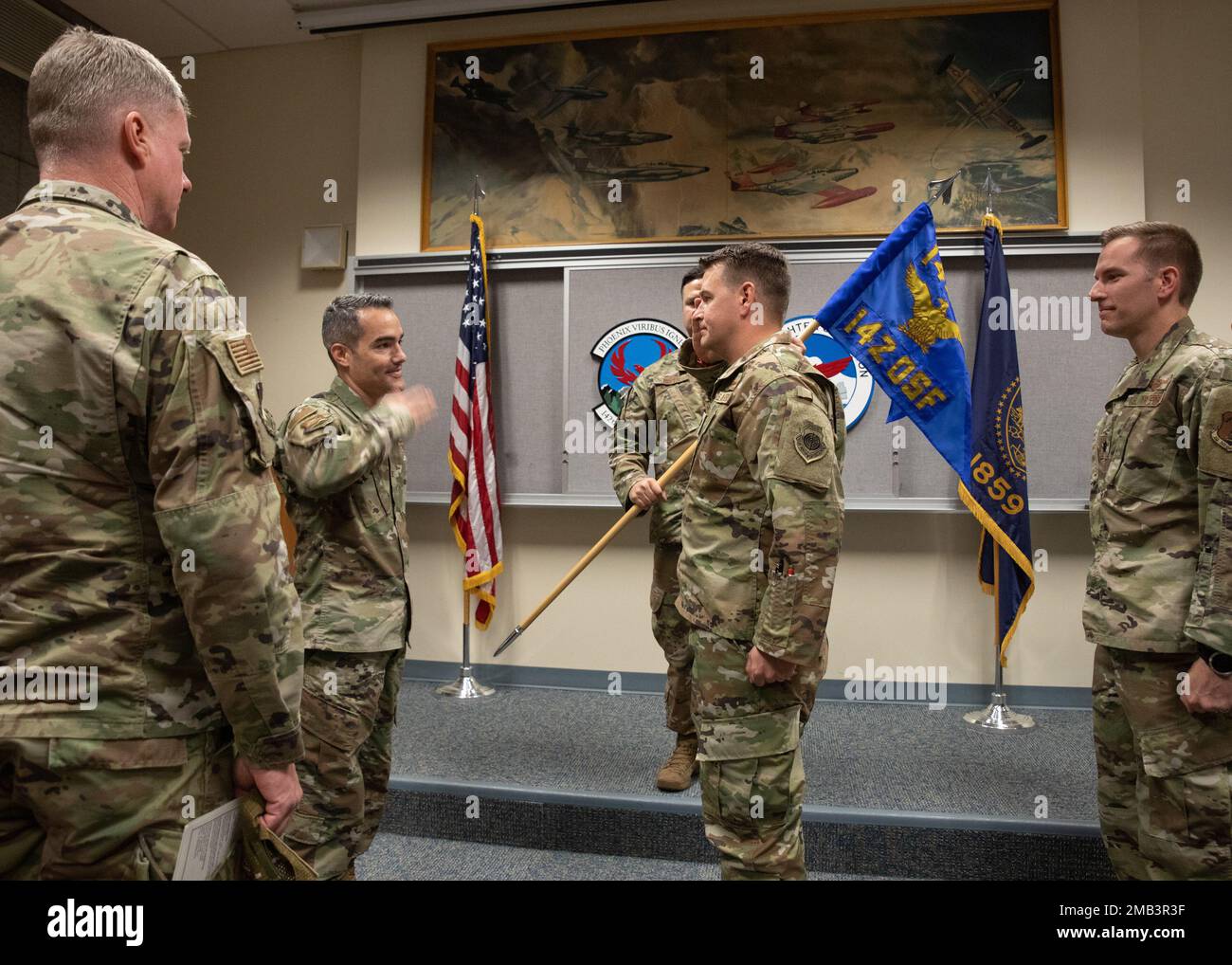 The 142nd Operations Support Squadron held a change of command ceremony ...