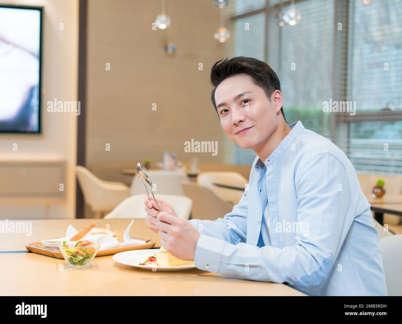 The young man's afternoon tea time Stock Photo - Alamy