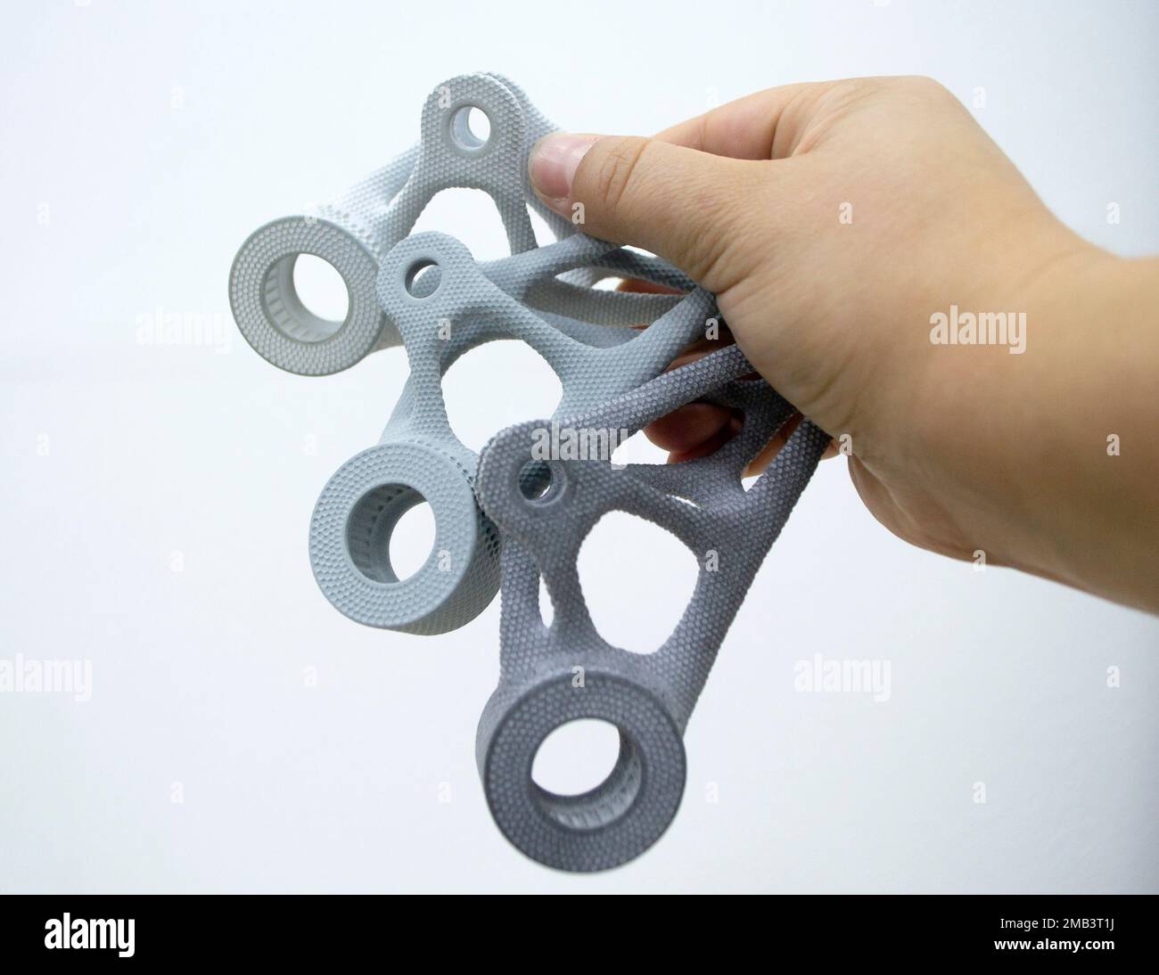 Person holding plastic model printed on powder 3d printer from ...