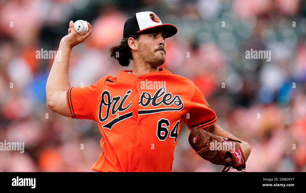 Baltimore Orioles starting pitcher Dean Kremer throws a pitch to the ...