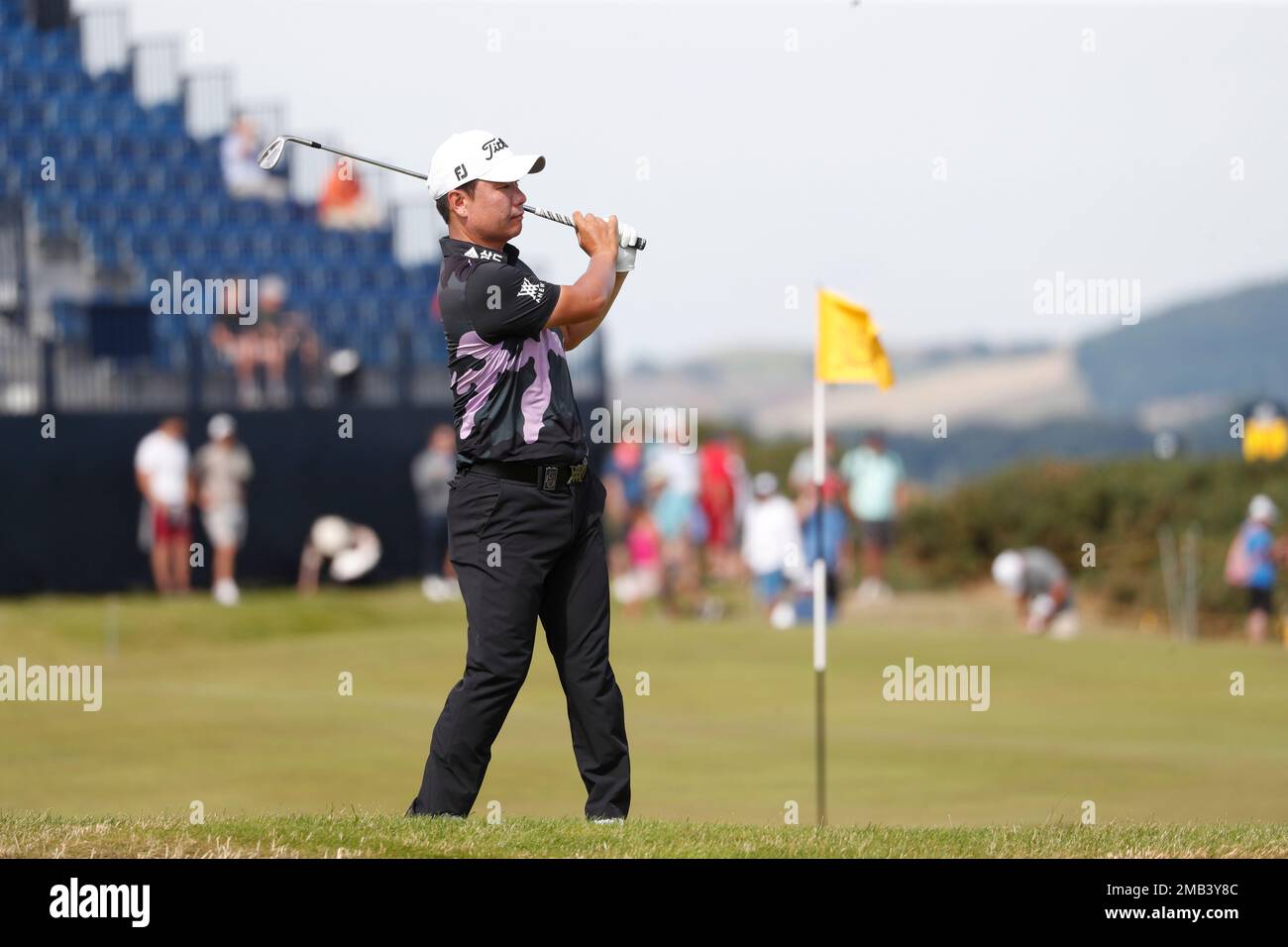 South Korea's Mingyu Cho plays the 4th hole during a practice round at ...