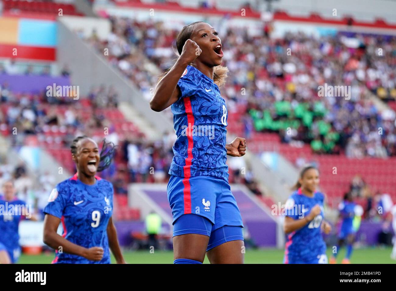 France's Grace Geyoro, right, celebrates after scoring the opening goal ...