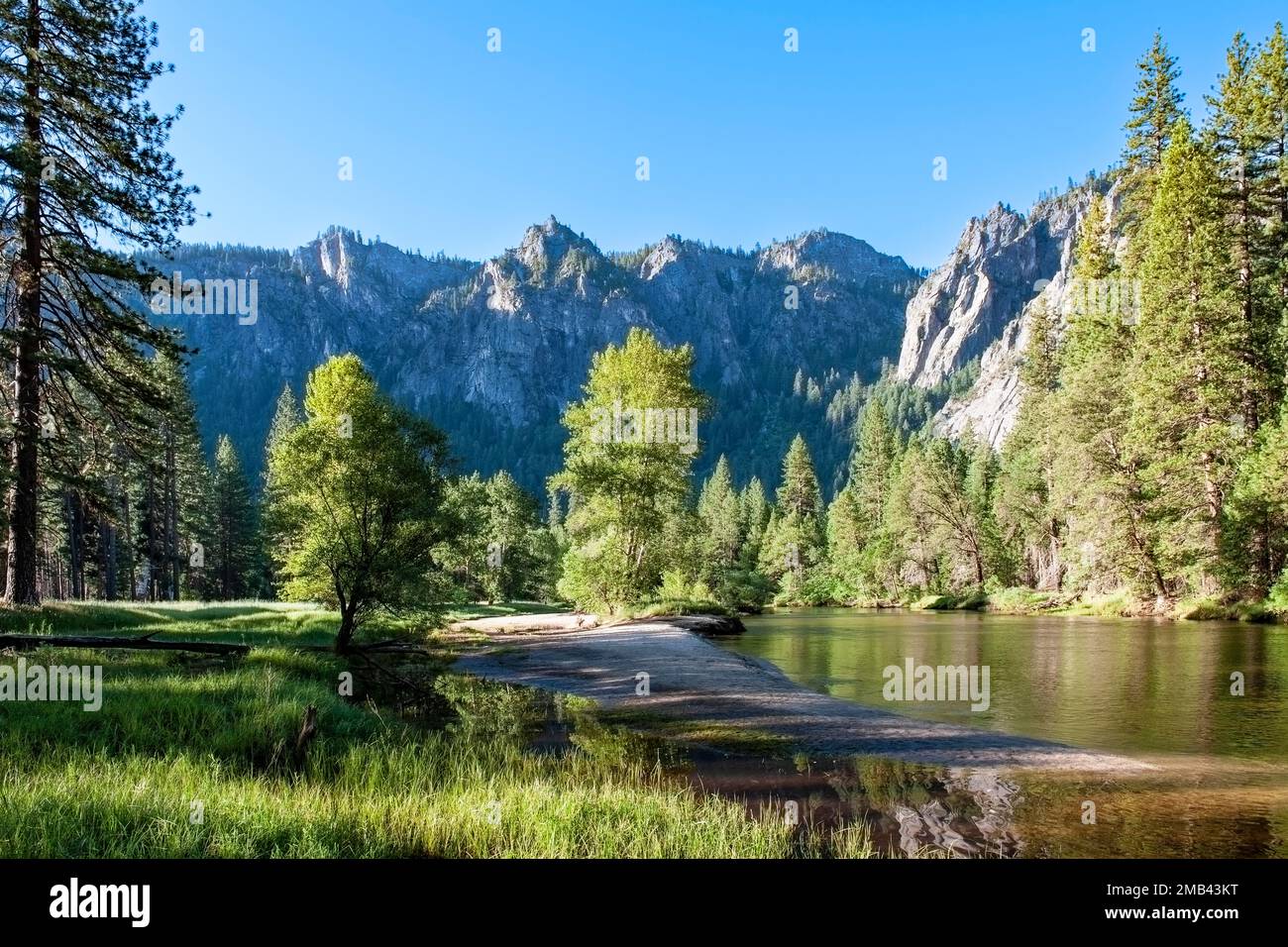 Typical landscape in the morning, with Merced River, in Yosemite ...