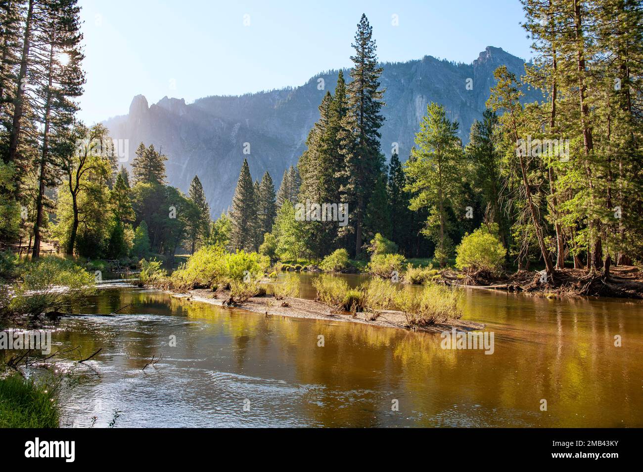 Typical landscape in the morning, with Merced River, in Yosemite ...