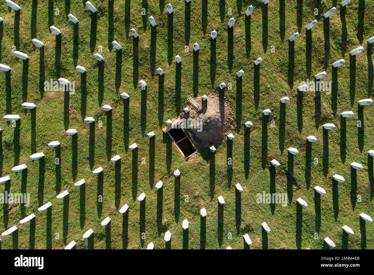 An aerial view of the Srebrenica Genocide Memorial Center and the newly dug graves in Potocari ...