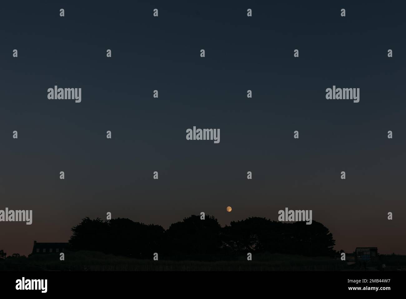 Moon over Port Blanc, Brittany, France Stock Photo - Alamy