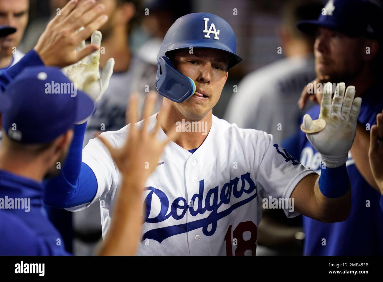Los Angeles Dodgers' Jake Lamb (18) returns to the dugout after hitting ...