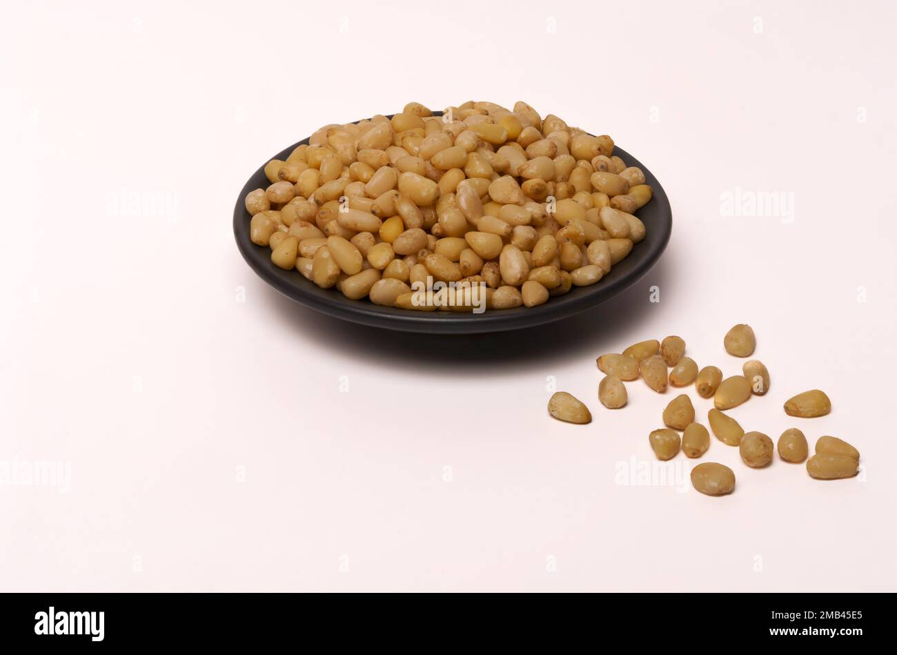 Fresh peeled pine nuts hi-res stock photography and images - Alamy