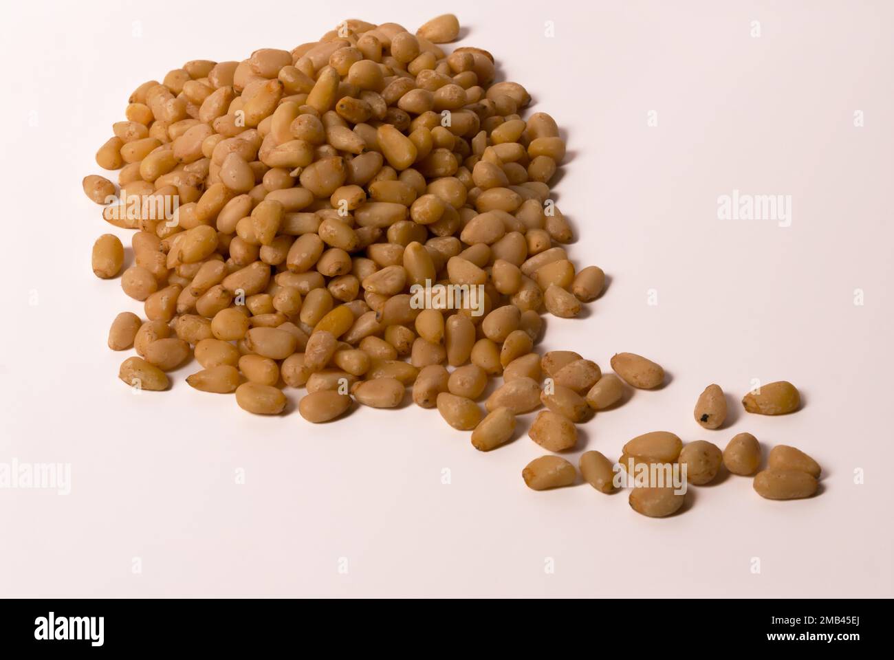 Fresh peeled pine nuts hi-res stock photography and images - Alamy
