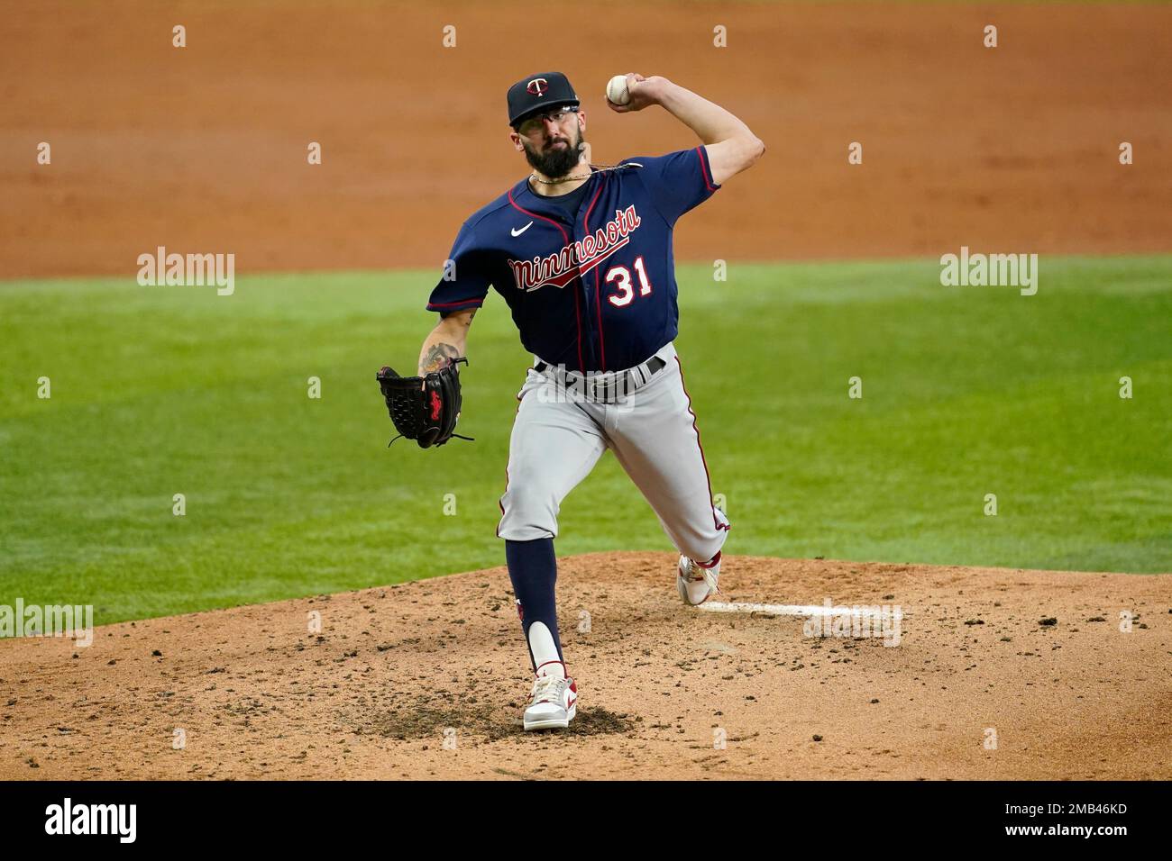 Minnesota Twins starting pitcher Devin Smeltzer throws to the Texas ...