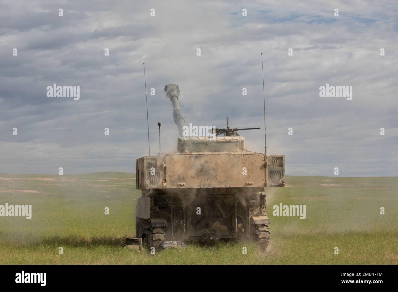 Cannon crewmembers from Bravo Battery, 1st Battalion, 145th Field Artillery, Utah National Guard ...