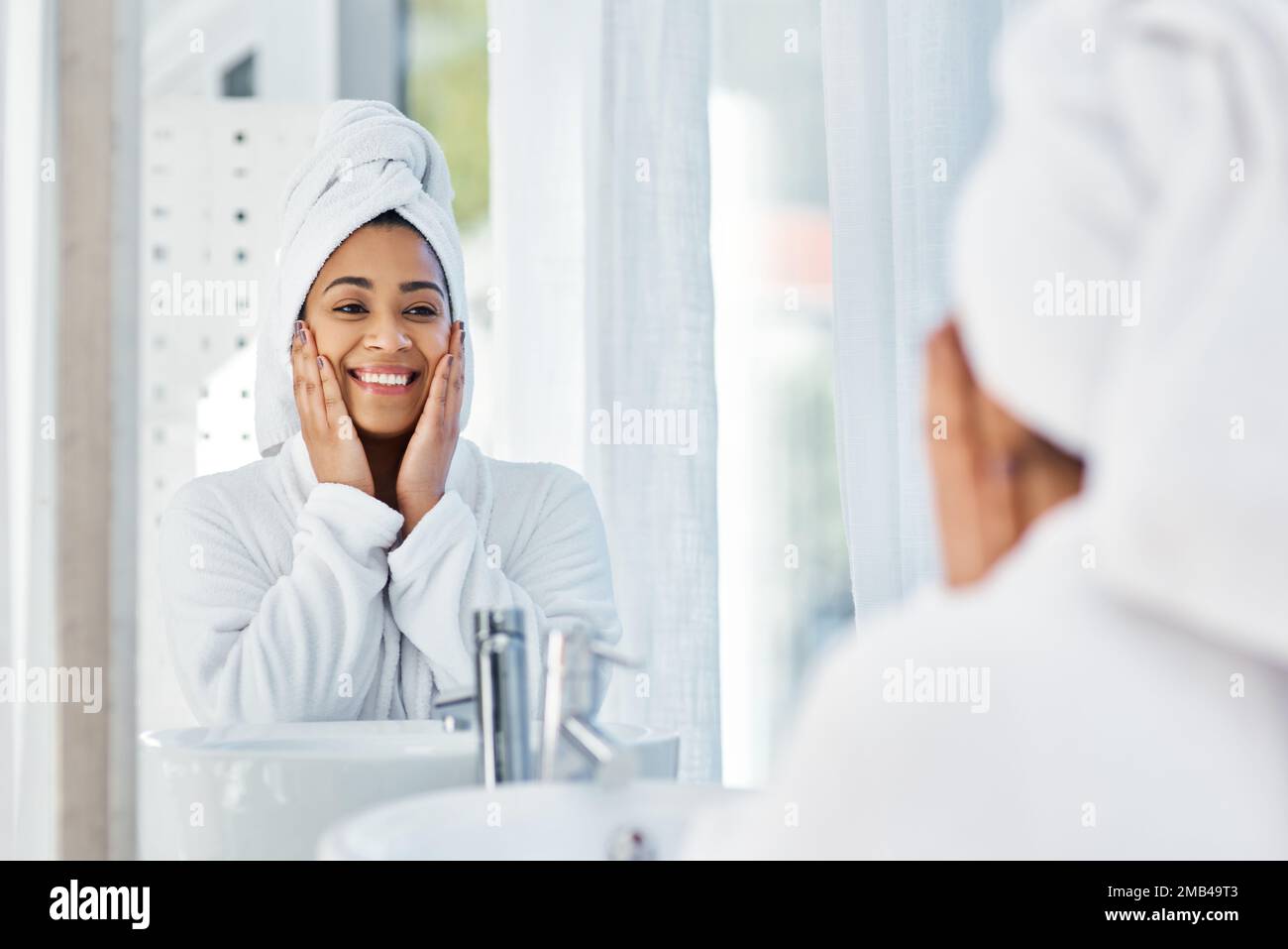 Learn to love yourself everyday. a young woman going through her beauty ...