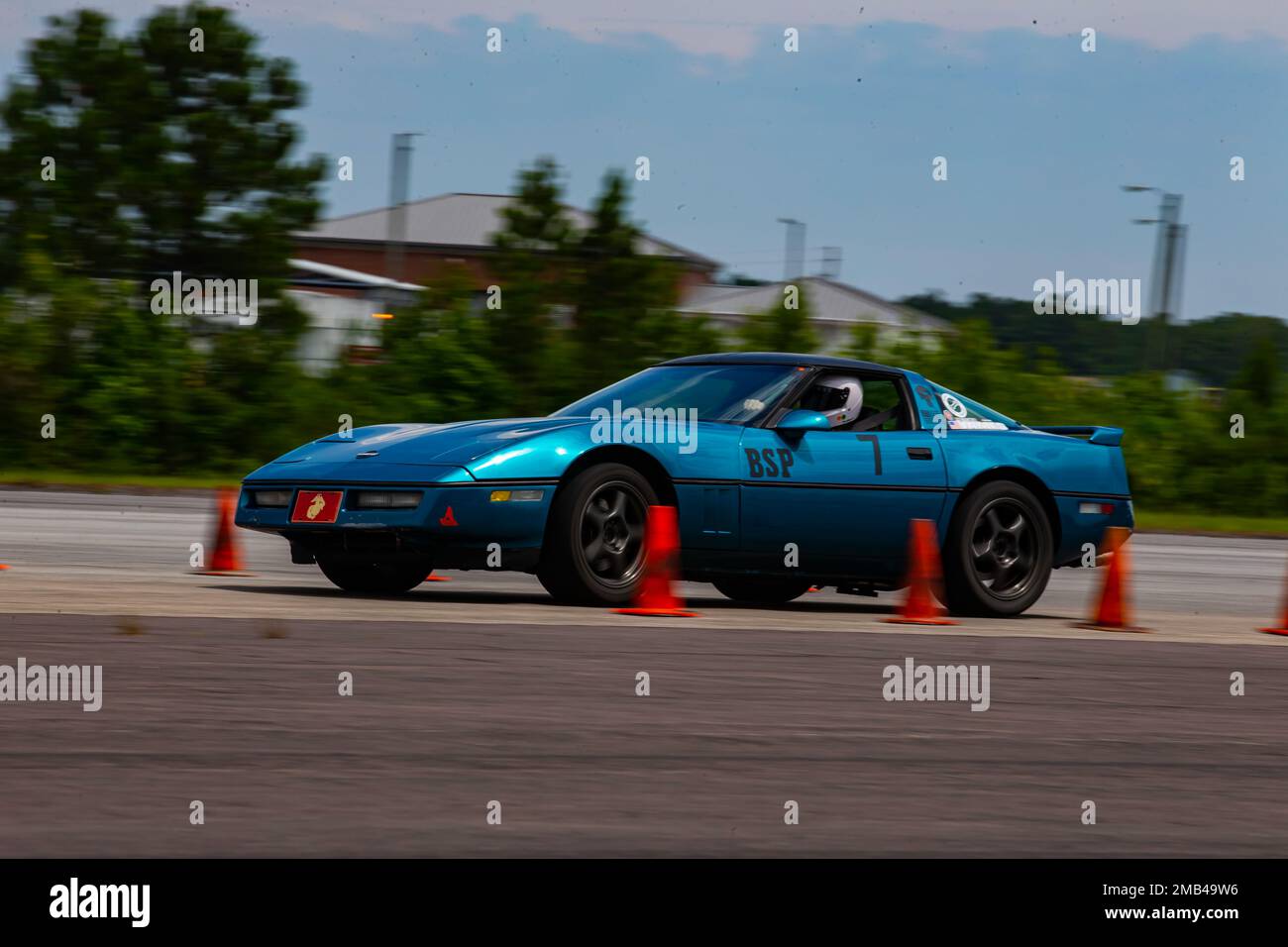 Fletcher James, driving a 1987 Chevrolet Corvette, races to the finish ...
