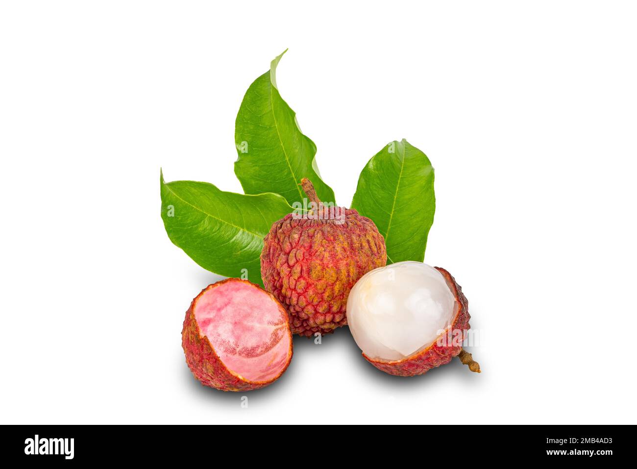 Whole and half ripe lychee with green leaves isolated on white ...