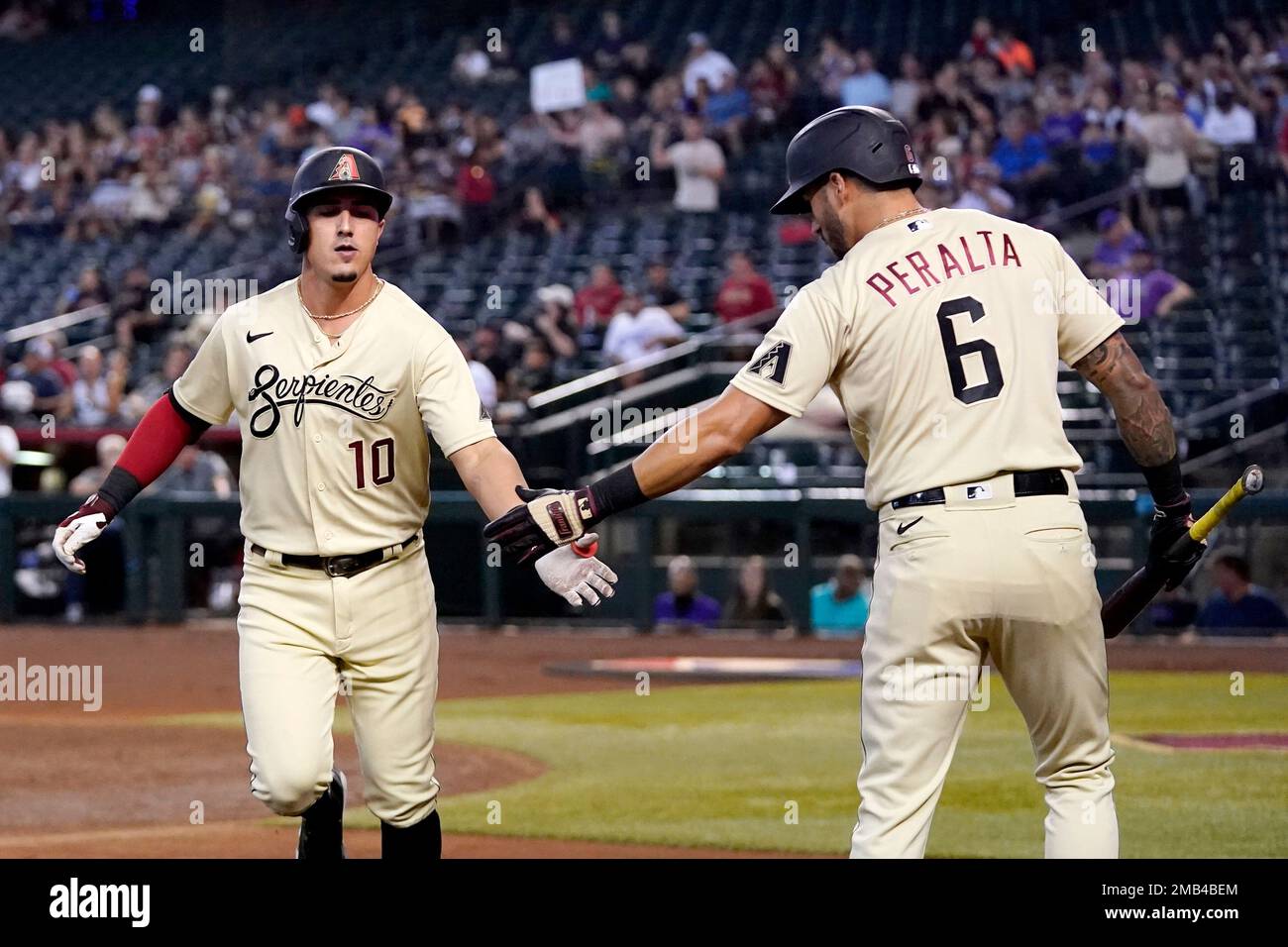 Arizona Diamondbacks' Josh Rojas (10) celebrates his home run against ...
