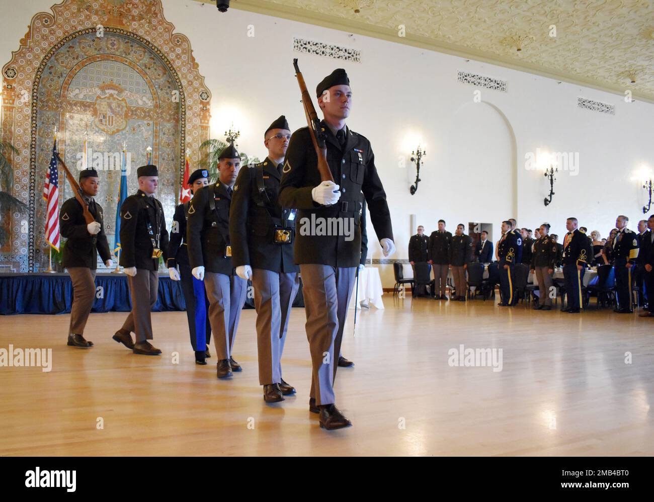 Members of the color guard retreat from the ballroom after posting the ...