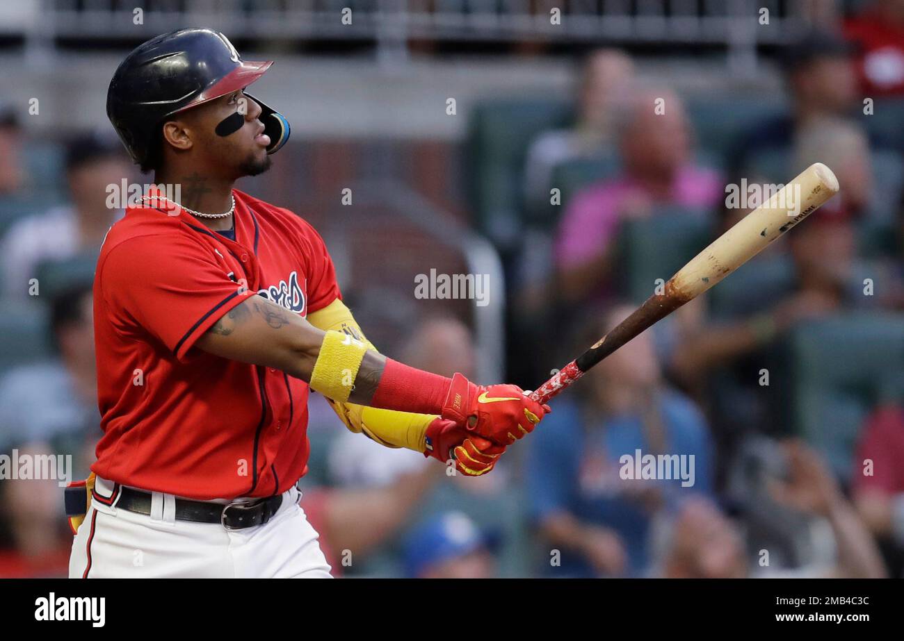 Atlanta Braves' Ronald Acuña Jr. watches his three-run home run off ...