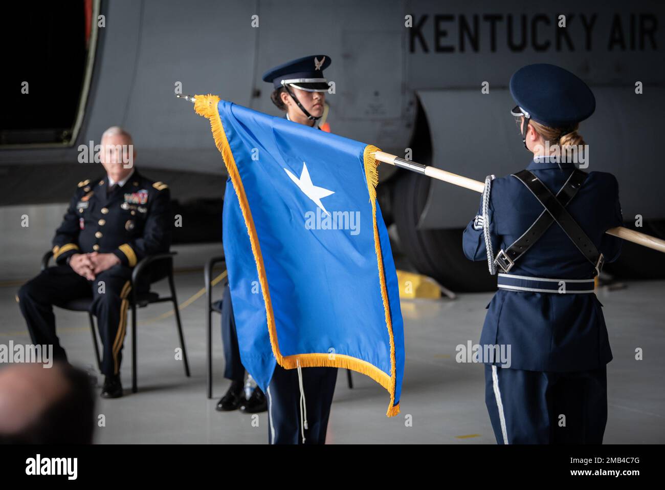 Members of the 123rd Airlift Wing Color Guard unfurl the personal flag ...