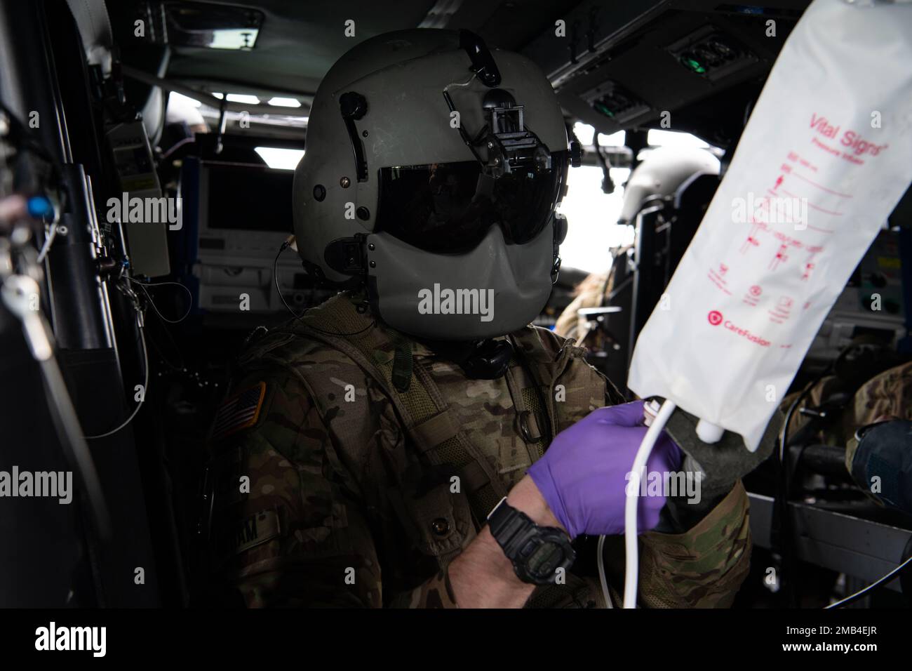 U.S. Army Staff. Sgt. Michael Witham, a flight medic with the 126th ...