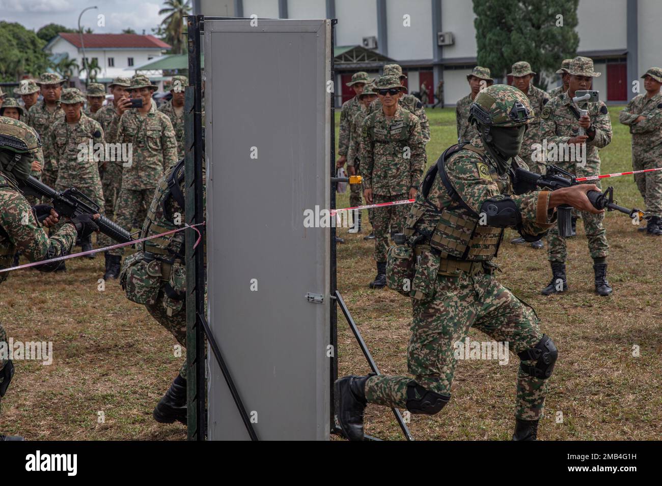 Malaysian Armed Forces demonstrate their breaching tactics to U.S. Army Soldiers from 3rd ...