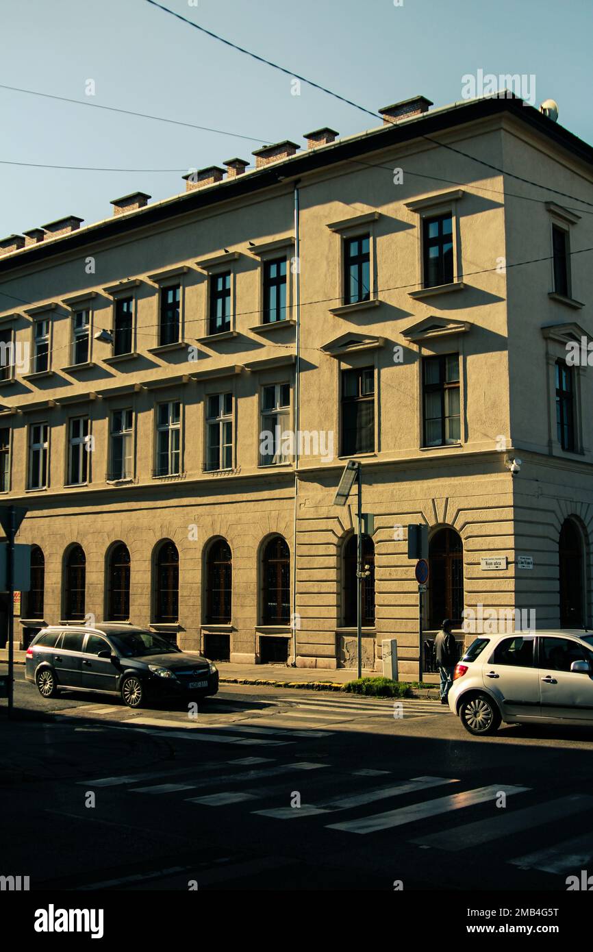 a building on the street corner Stock Photo - Alamy