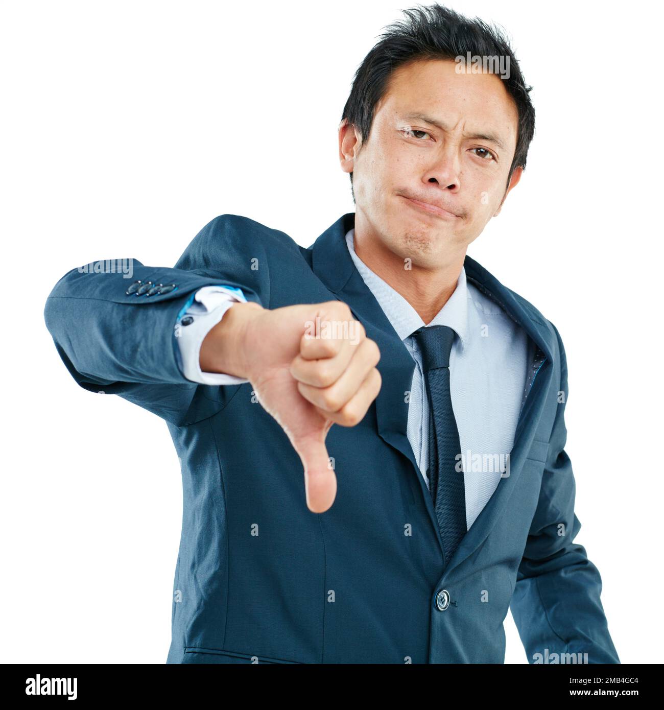 Portrait, business man and thumbs down in studio isolated on white ...