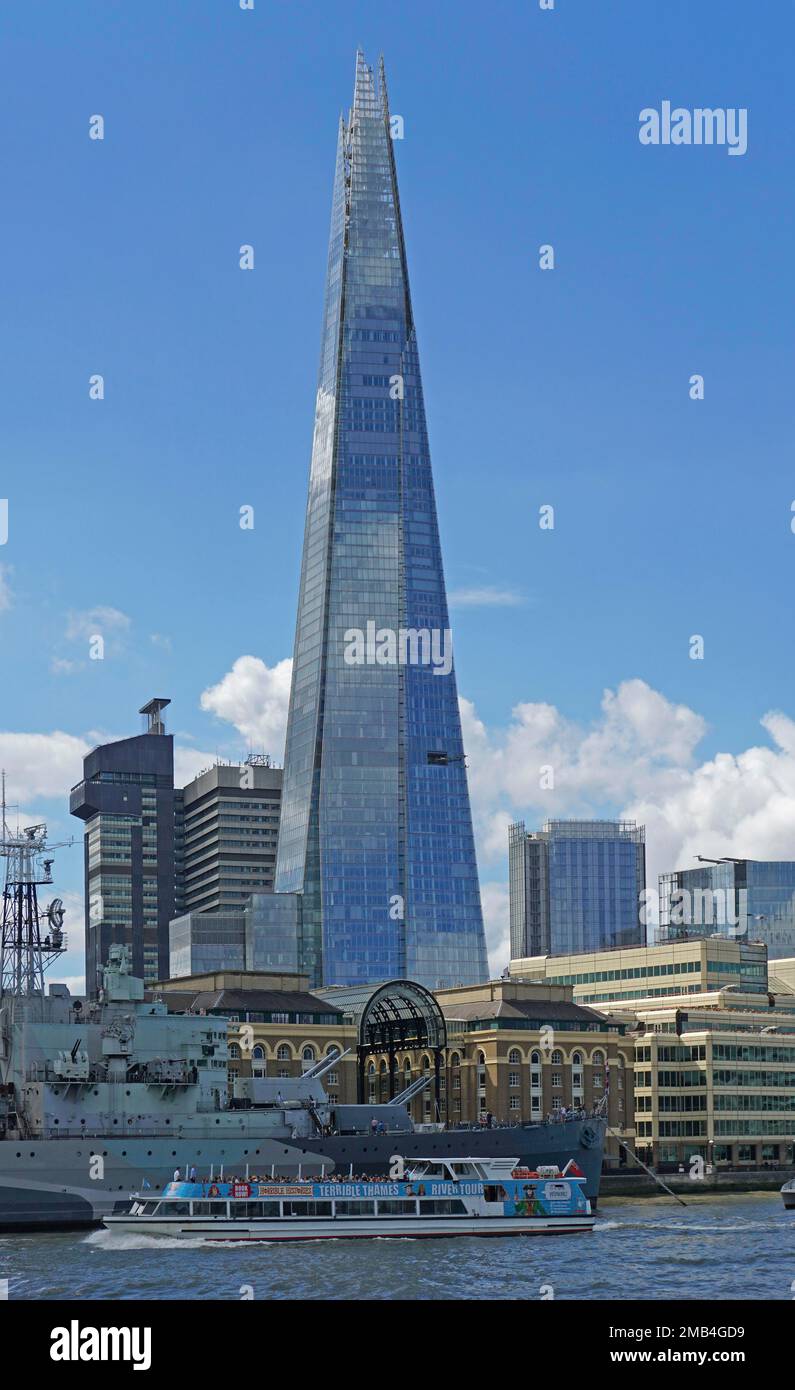 Excursion ship and museum ship HMS Belfast on the banks of the Thames ...