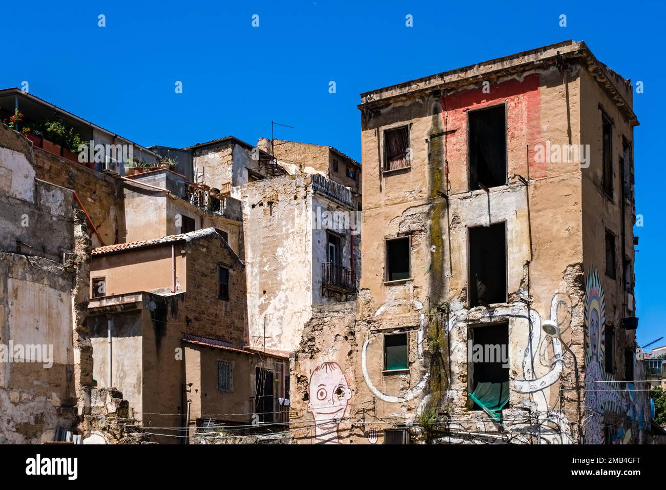 Facades of ruined buildings in Palermo Stock Photo - Alamy