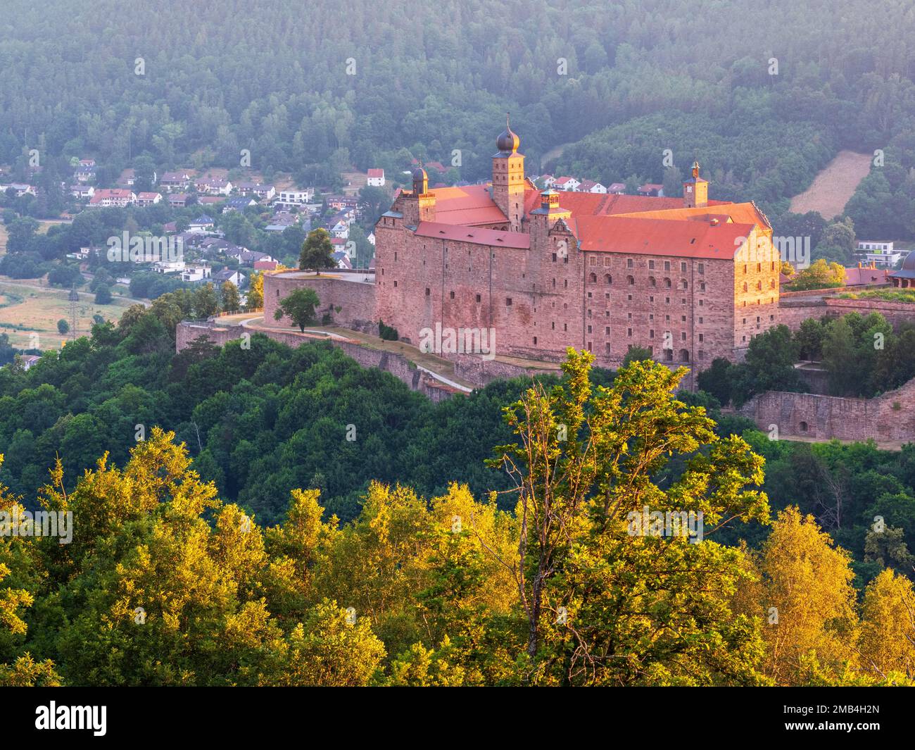 View of the Plassenburg in the first morning light, Kulmbach, Upper ...