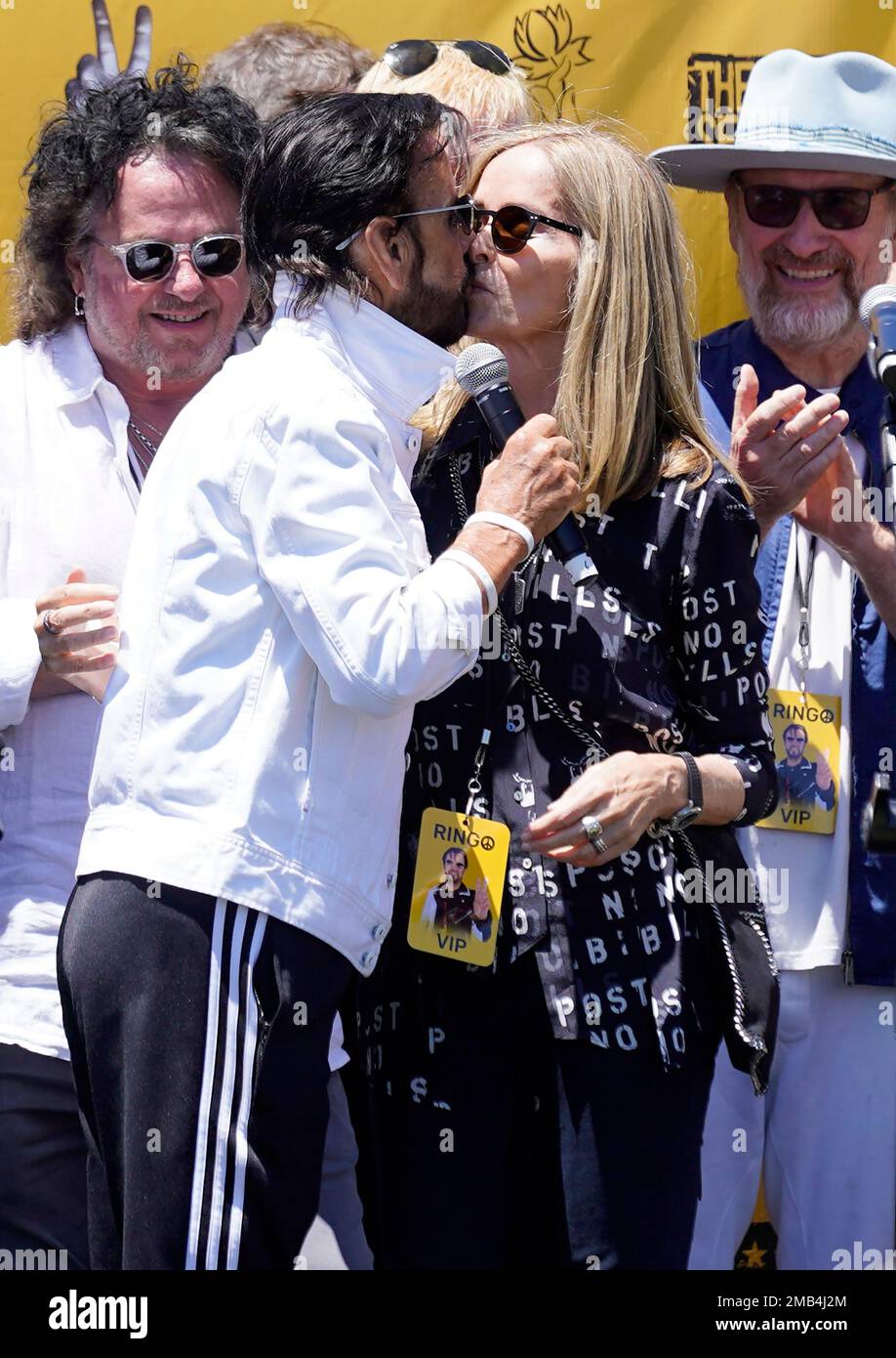Ringo Starr kisses his wife Barbara Bach during his annual Peace & Love ...