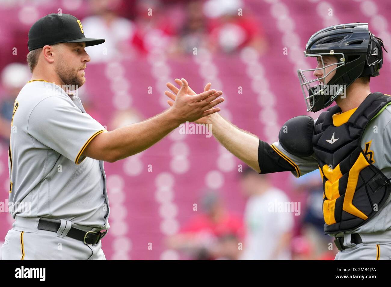 Pittsburgh Pirates relief pitcher David Bednar, left, celebrates with ...