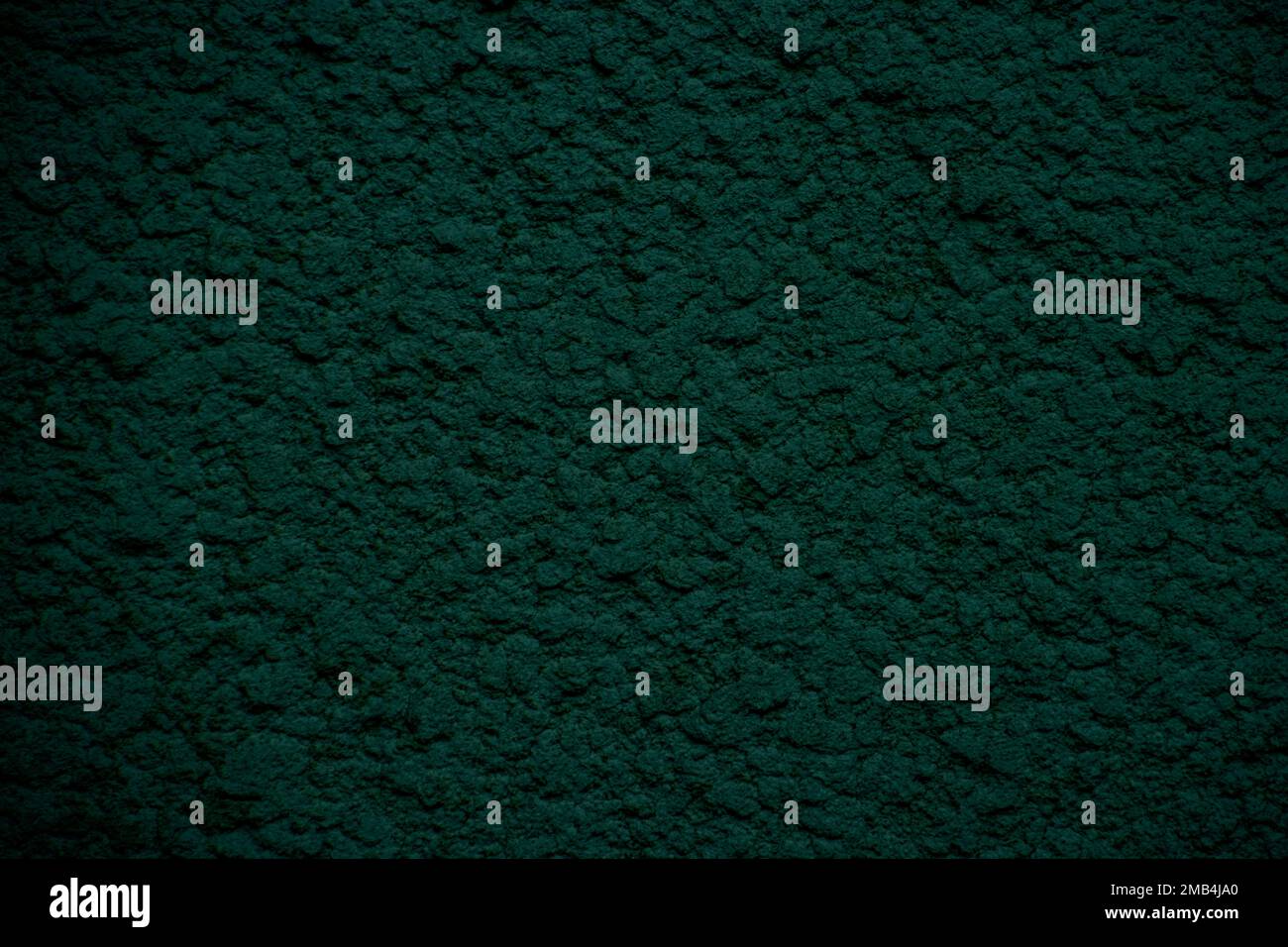 Teal colored abstract wall background with textures of different shades ...